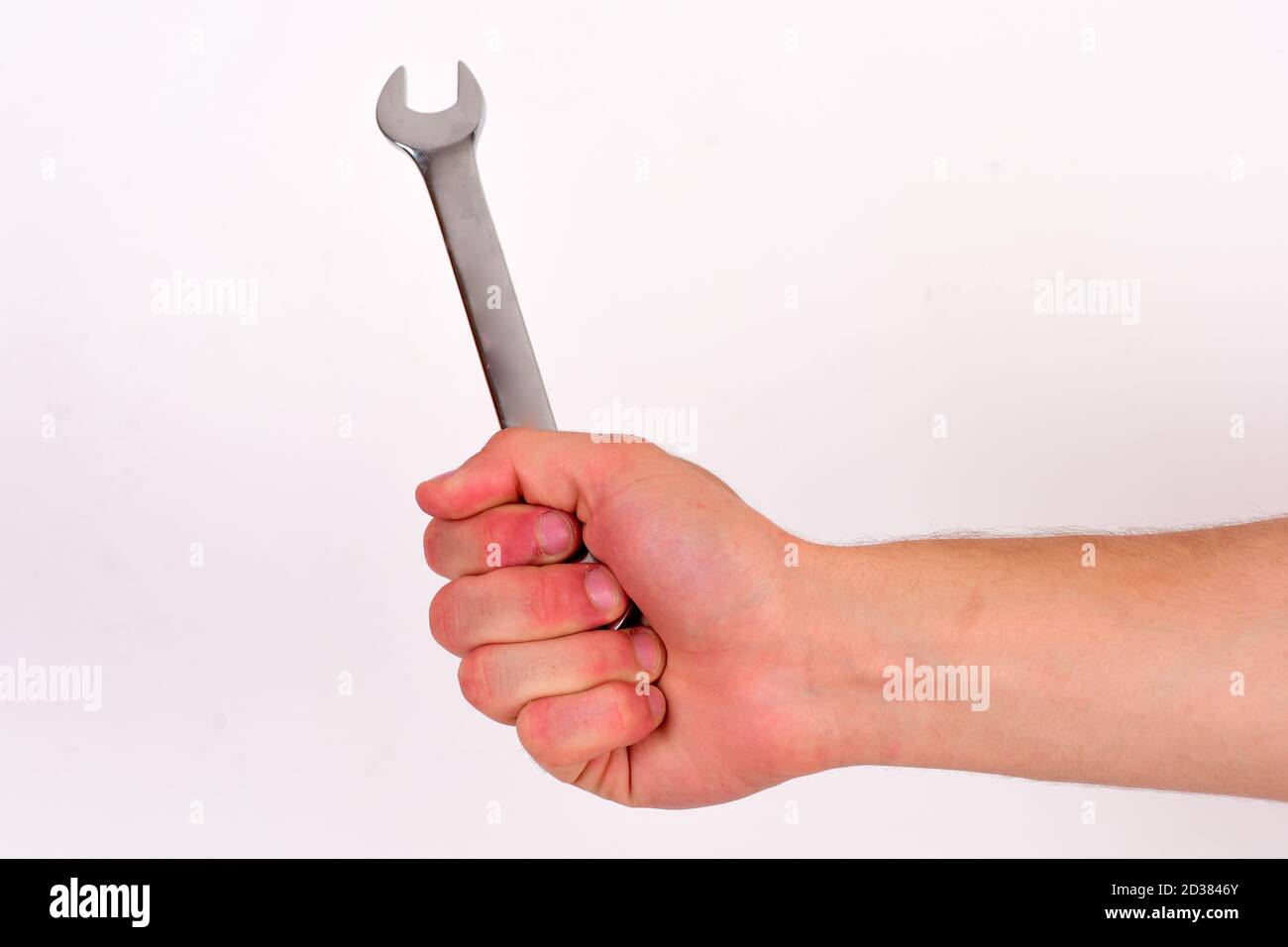 Repairer or mechanic hand holds spanner instrument. Service and ...
