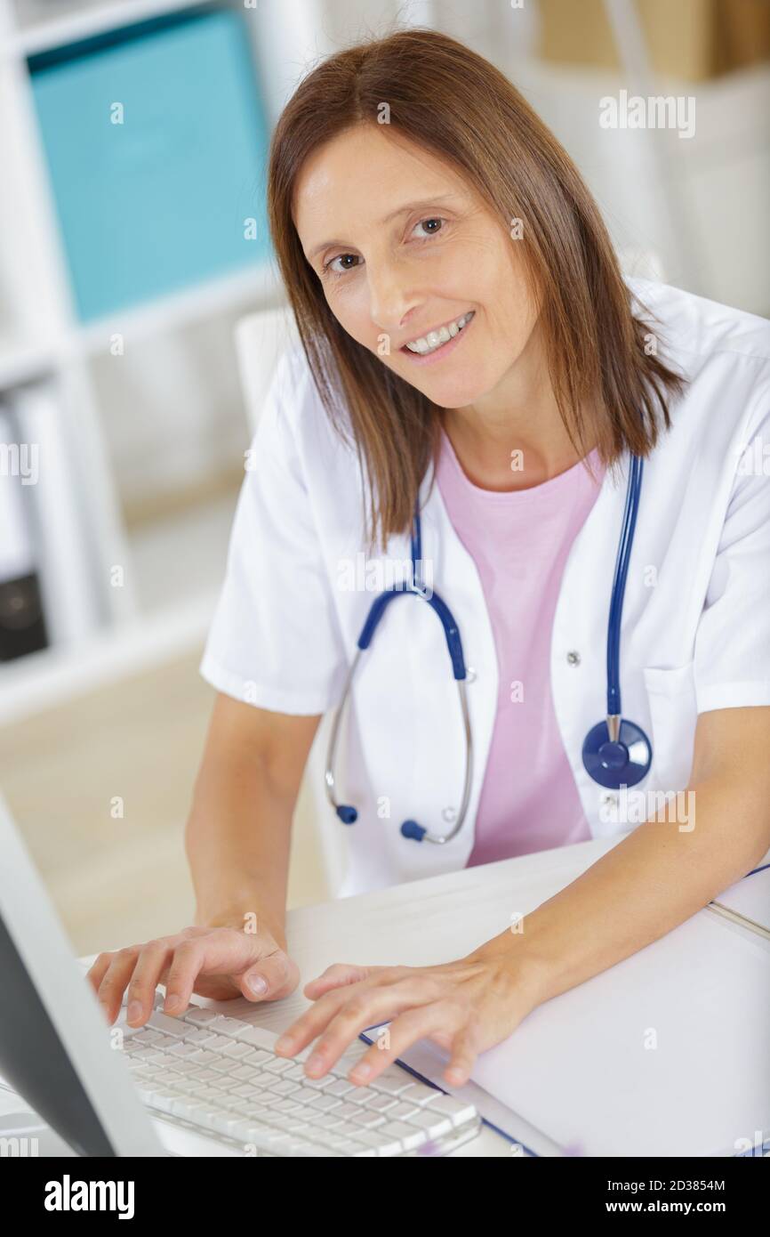 doctor woman hand typing in medical office Stock Photo - Alamy