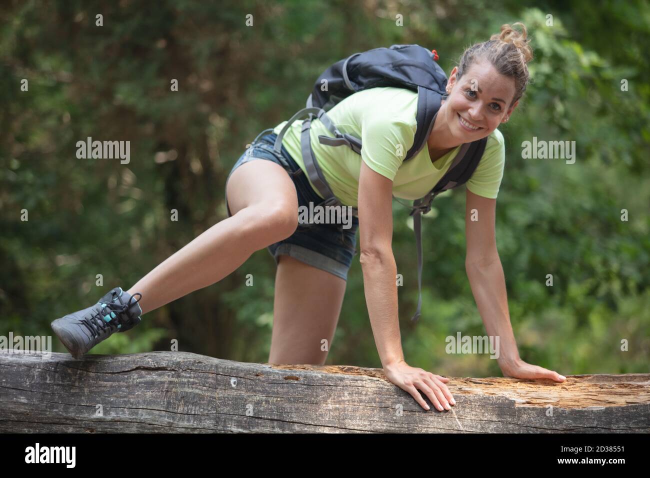 Climbing over tree trunk hi-res stock photography and images - Alamy