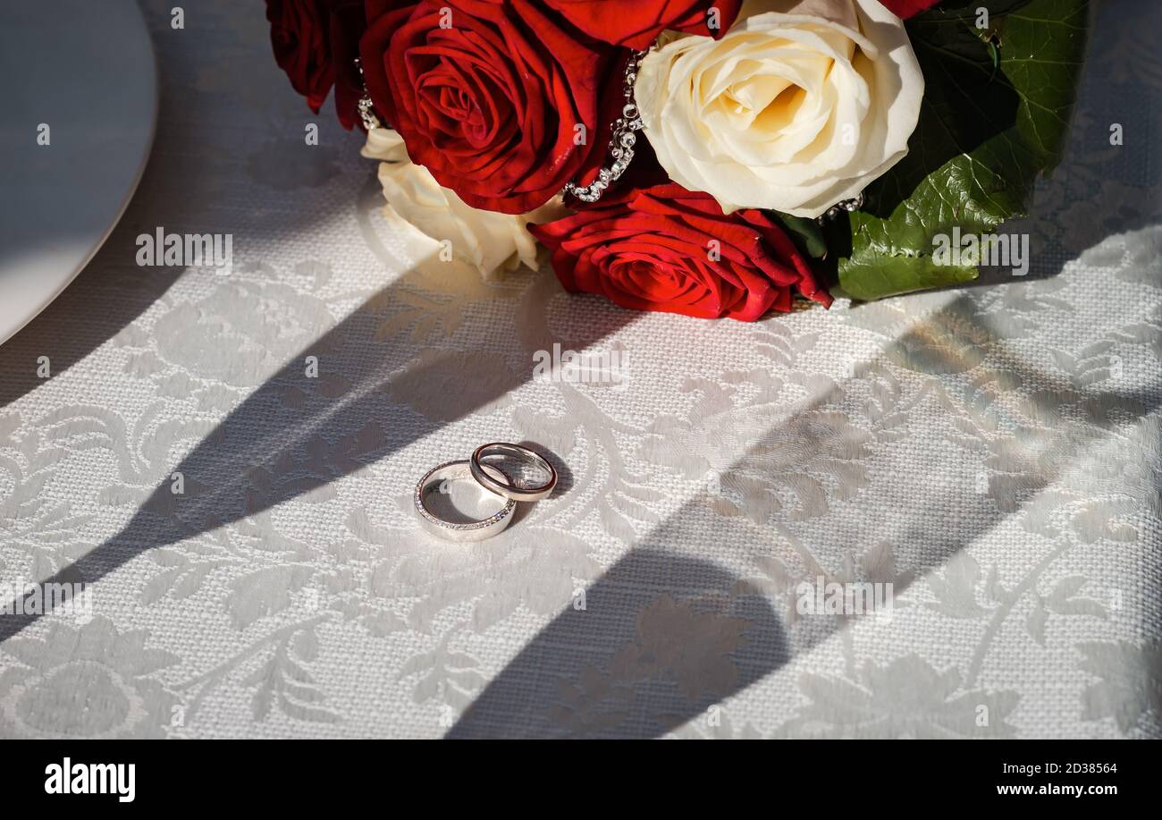 Precious wedding rings and bridal bouquet. Conceptual wedding ...