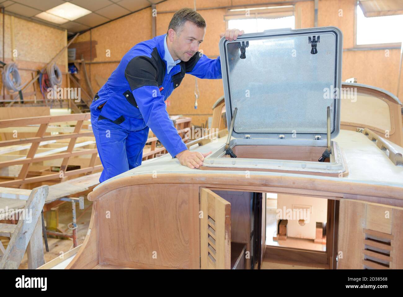installing skylight to the boat Stock Photo - Alamy