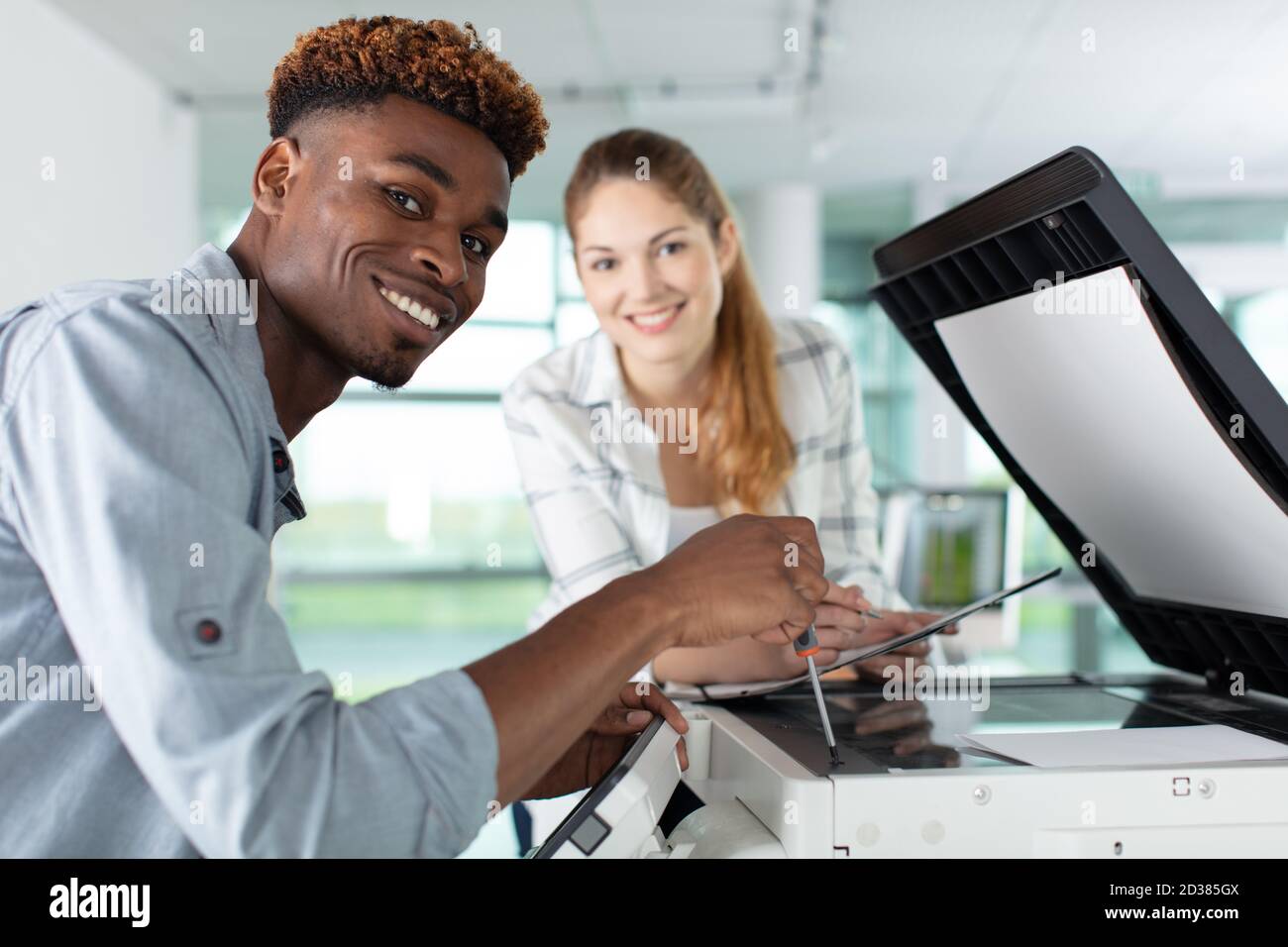 students using xerox photocopier in library at school Stock Photo - Alamy