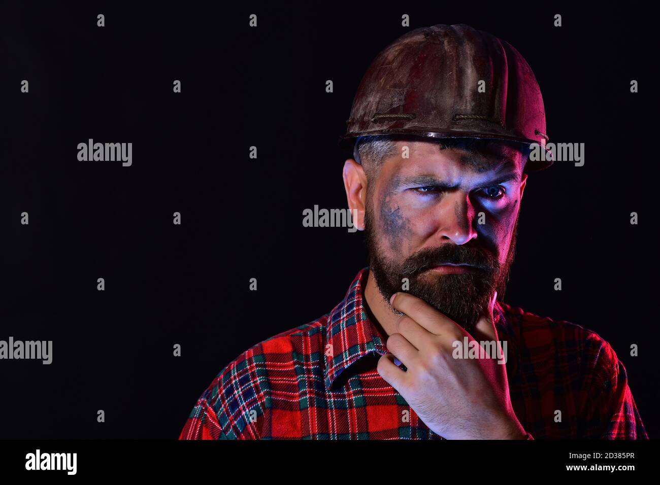 Builder or mine worker with thick beard. Construction and mining ...