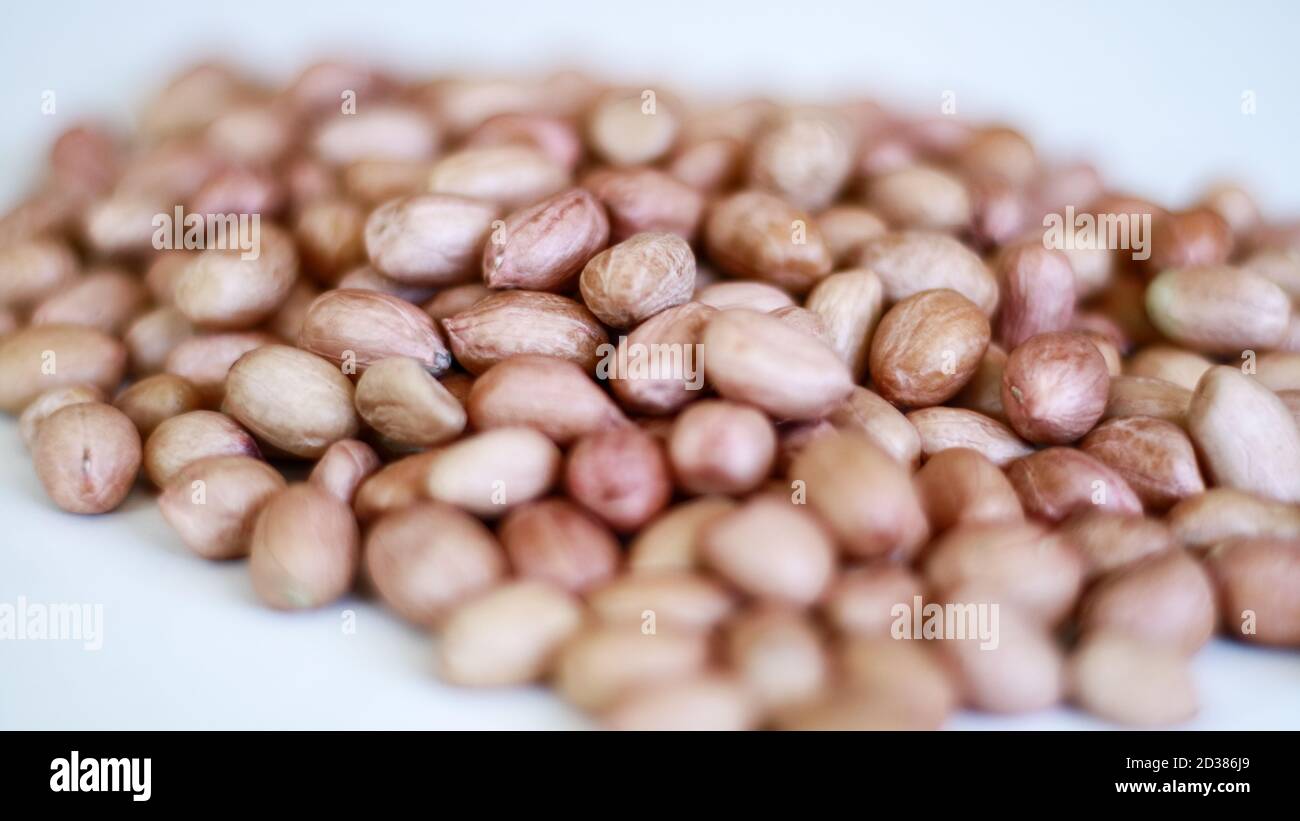 Peanuts or groundnut on white background Stock Photo - Alamy