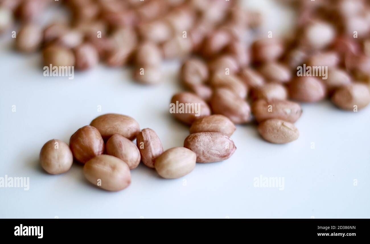 Peanuts or groundnut on white background Stock Photo - Alamy