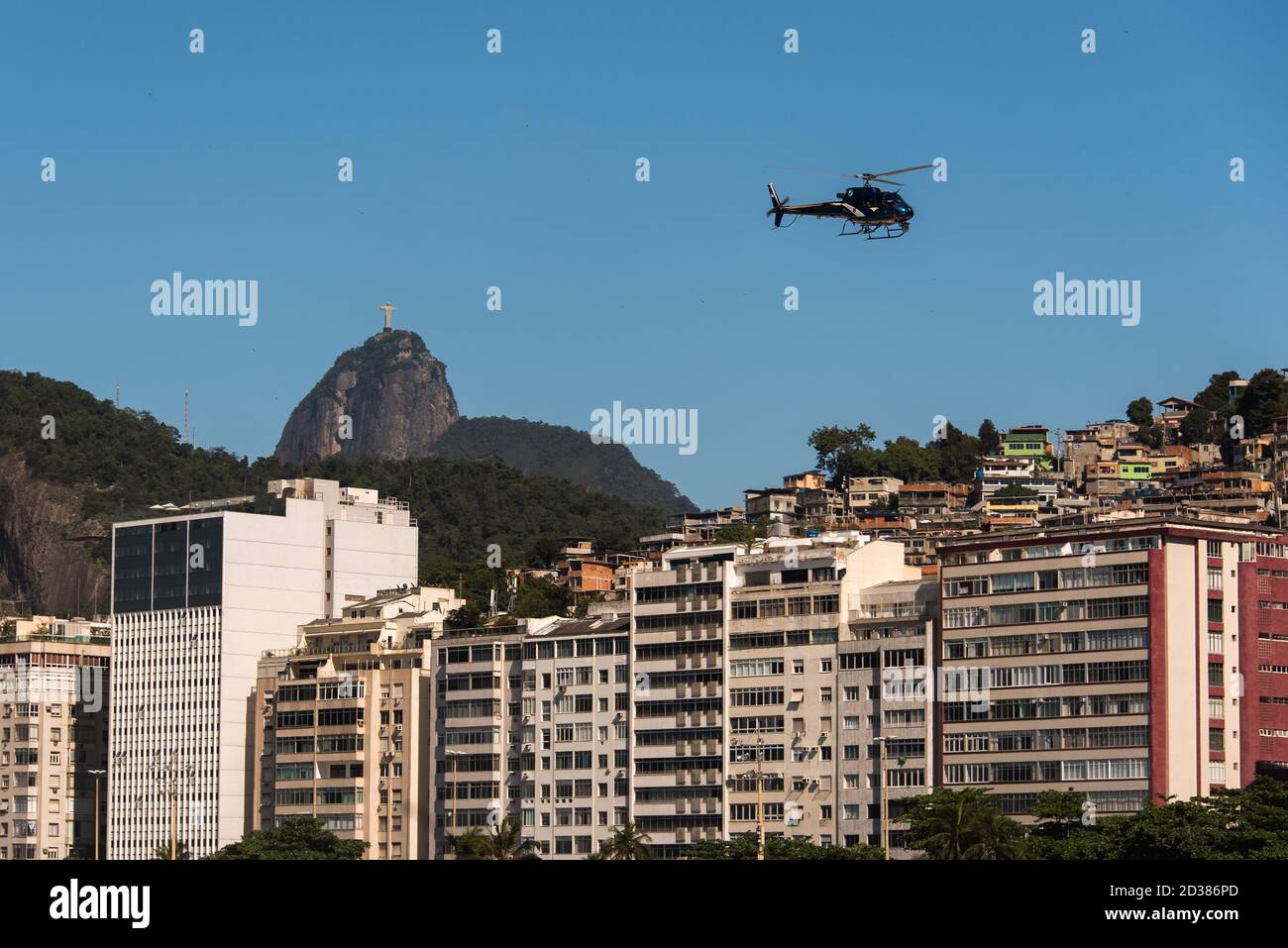 Helicopter Flying Above the Favela in Rio de Janeiro City Stock Photo ...