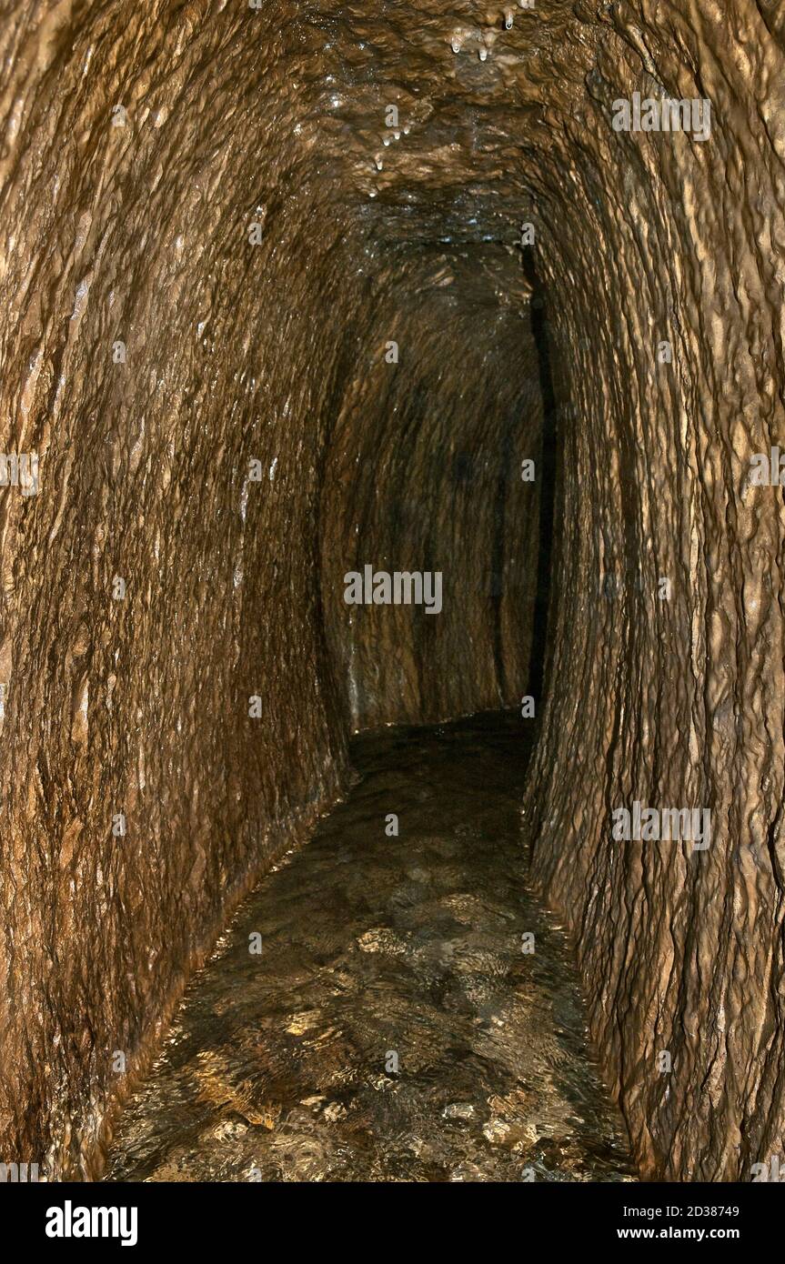 The narrow and very long hand-picked coffin level in Knotlow lead mine ...
