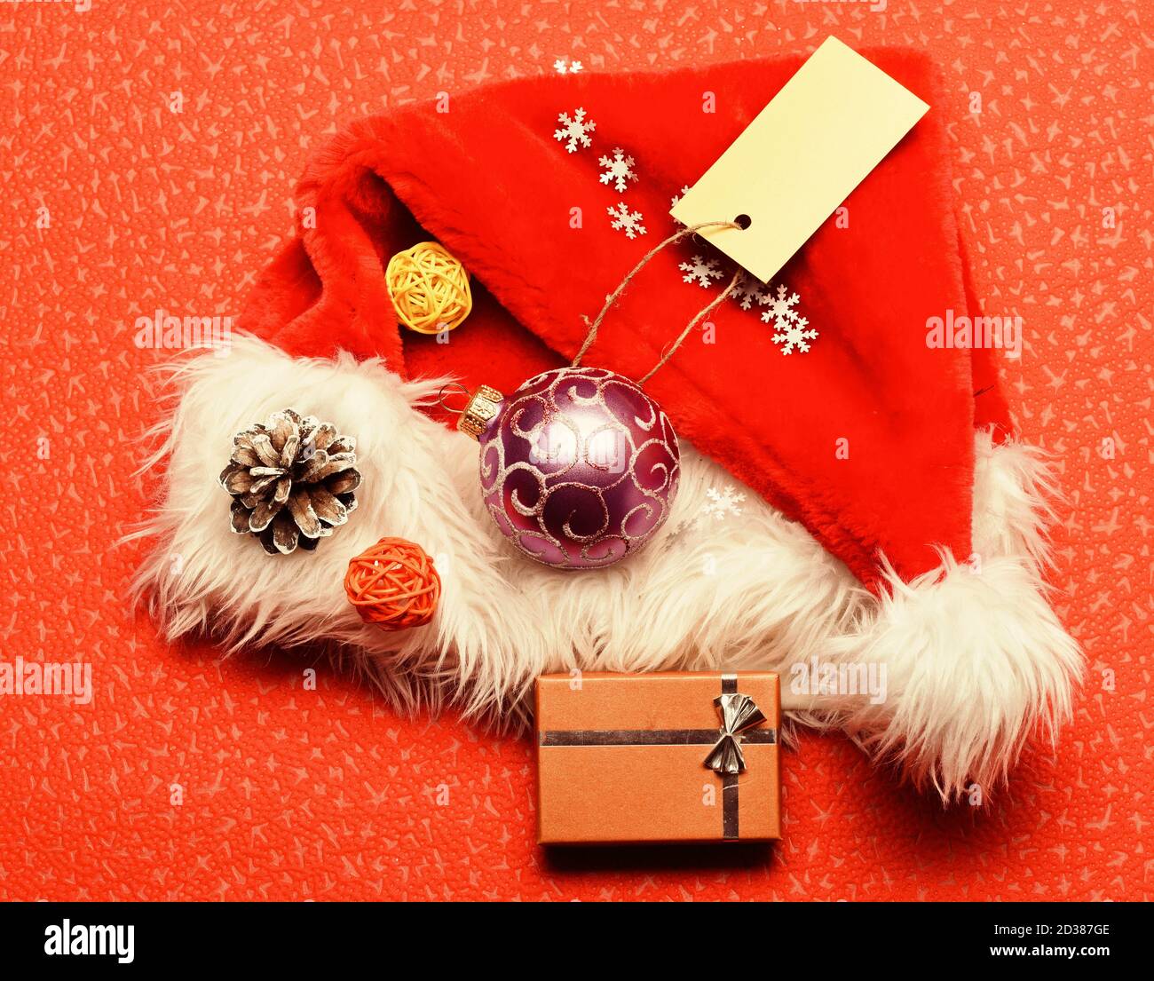 Santa hat with christmas gift box. Keep family traditions. Christmas ...