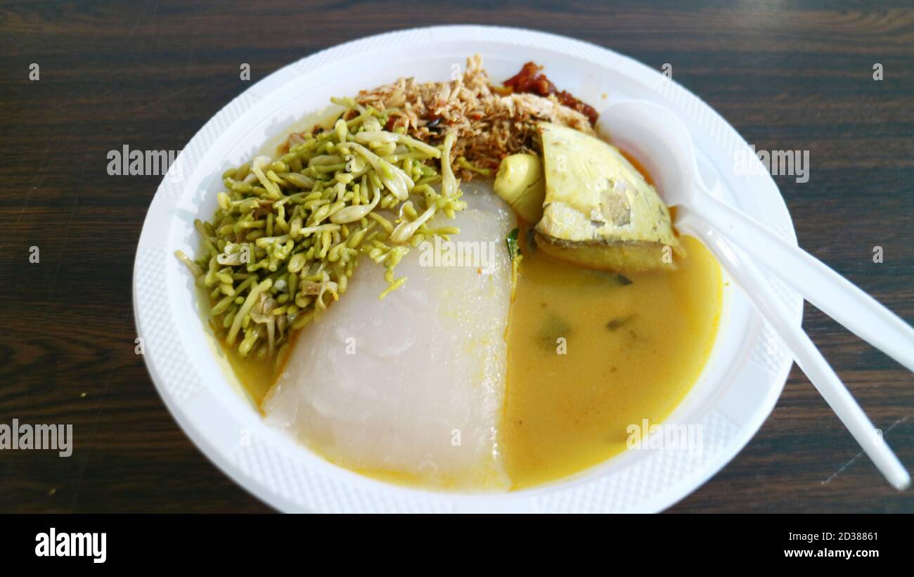Papeda, sauteed kale and fish. Papuan food (Indonesian Stock Photo - Alamy