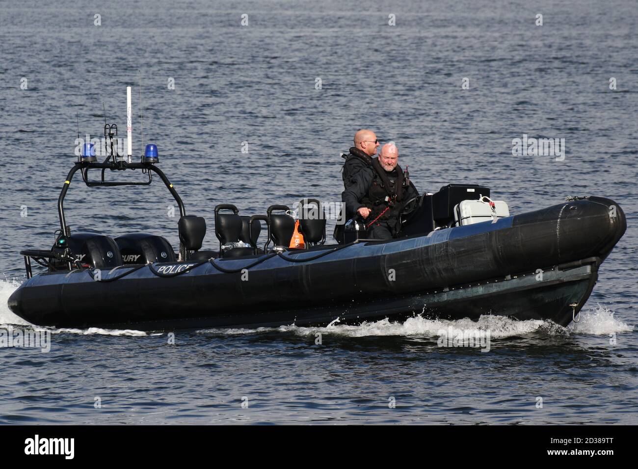 A Ministry of Defence Police RIB escorts the Royal Canadian Navy ...