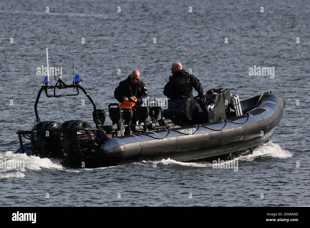 A Ministry of Defence Police RIB escorts the Royal Canadian Navy ...