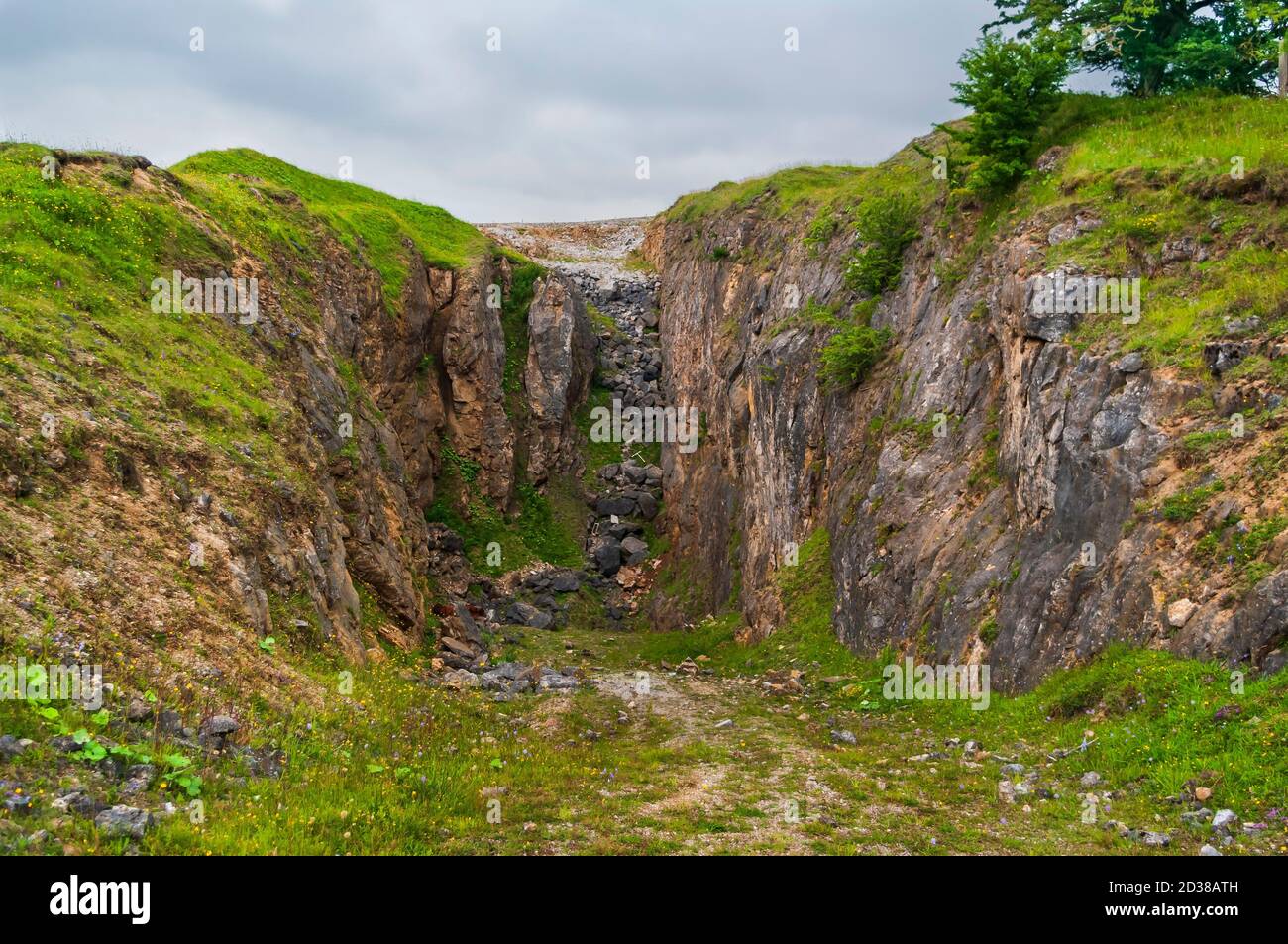 A deep and ancient opencut from lead mining enlarged by fluorspar ...