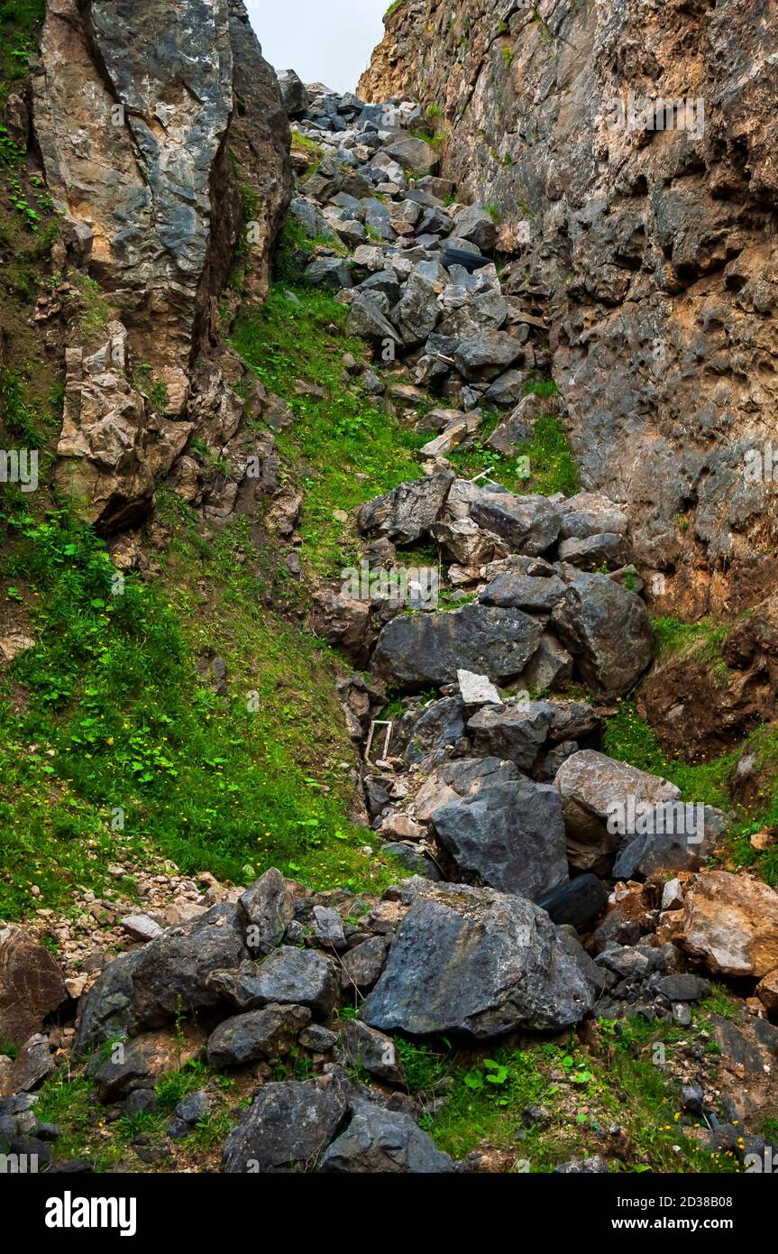 A deep and ancient opencut from lead mining enlarged by fluorspar ...