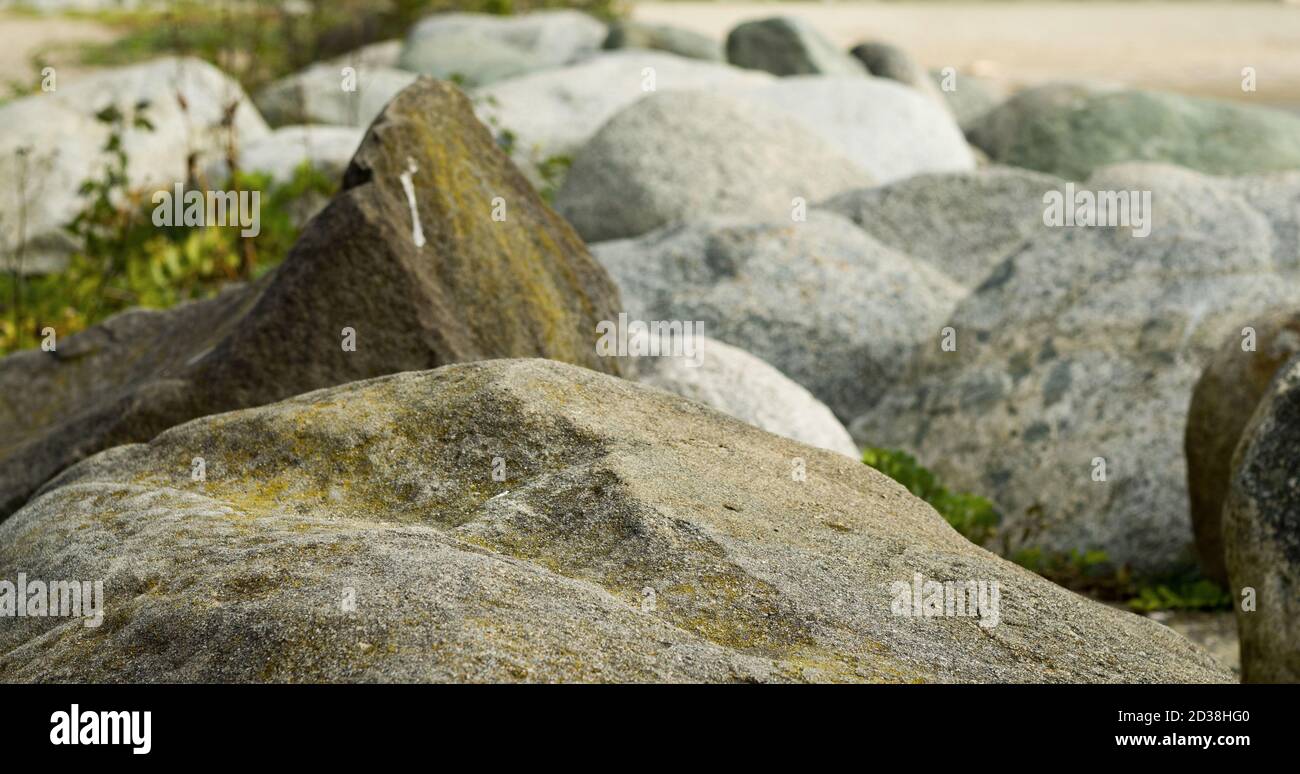 Rocks on the beach Stock Photo - Alamy