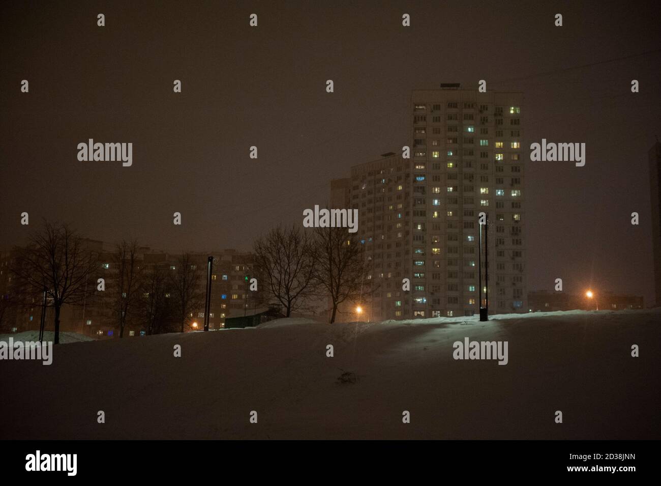 City at night in Russia during winter, high storey buildings in winter ...