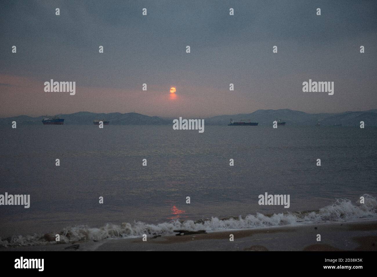 Large container ships moored in a harbour in Russian Far East port of ...
