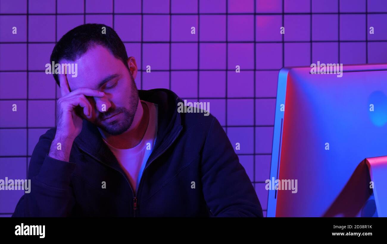 Bearded programmer hacker waiting for program to process. Tired Stock ...