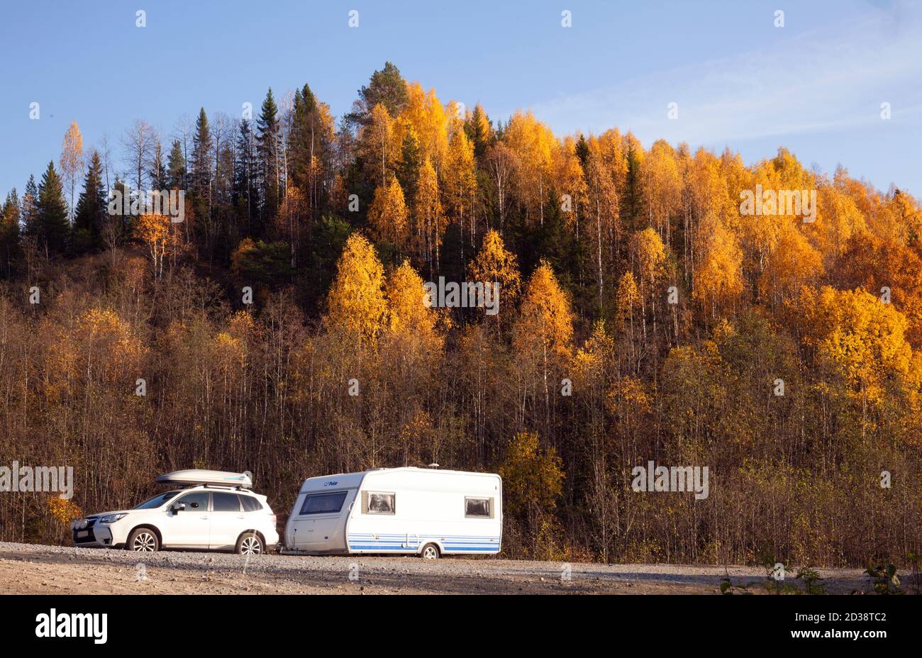 BJURHOLM, SWEDEN ON OCTOBER 02, 2020. View of a car and caravan this ...