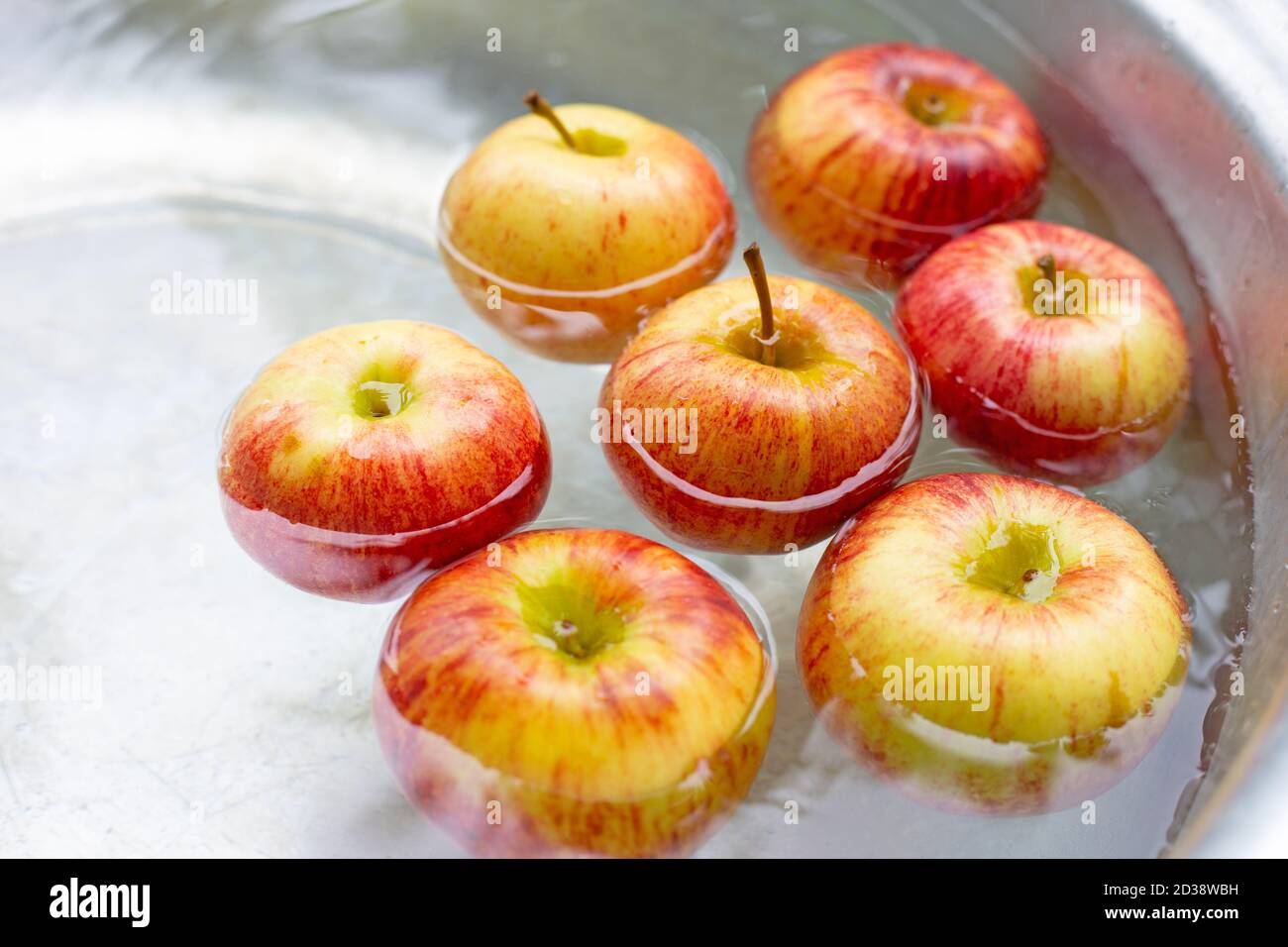 Washing fresh apples in the water Stock Photo - Alamy