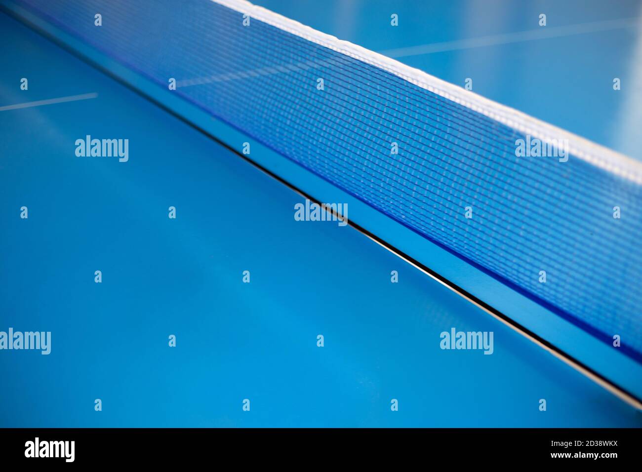 Net of table tennis ping pong on blue background Stock Photo - Alamy
