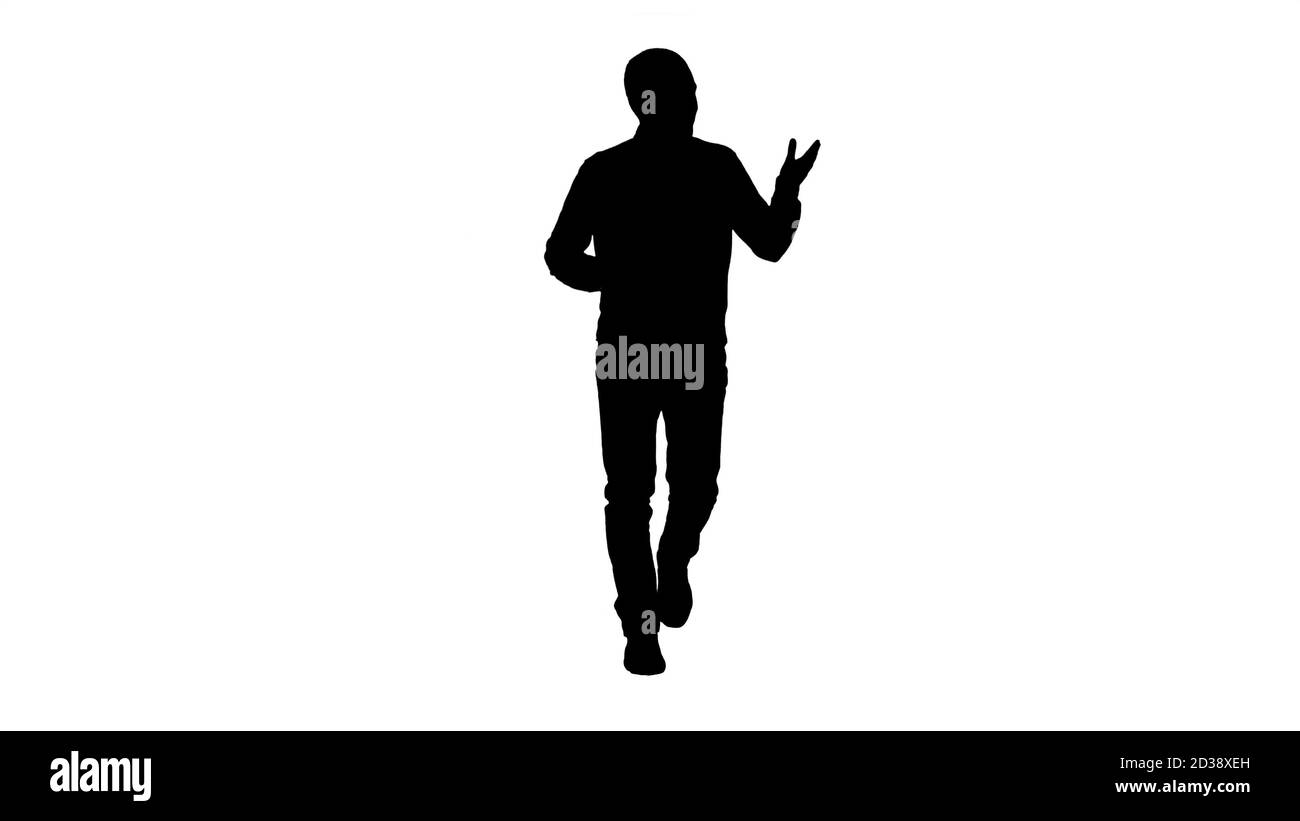 Silhouette young man approaching camera hi-res stock photography and ...