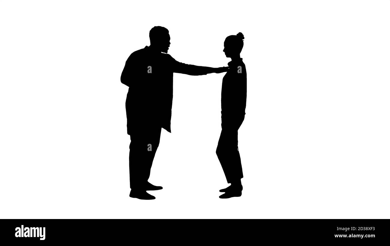 Silhouette Doctor telling good news and patient leaves Stock Photo - Alamy