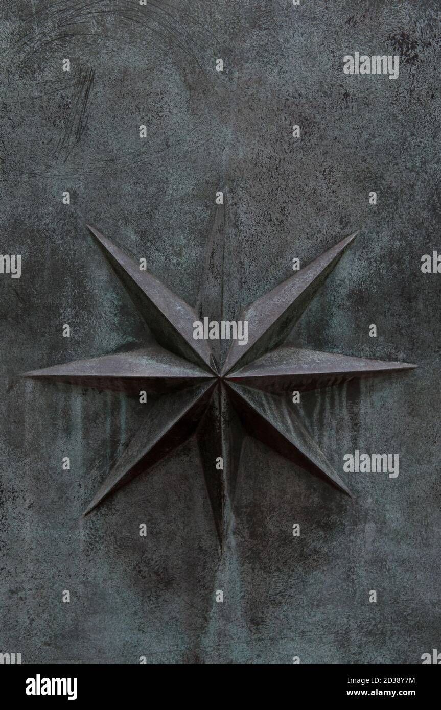 A Close Up Of An Eight Pronged Metal Star Stock Photo - Alamy