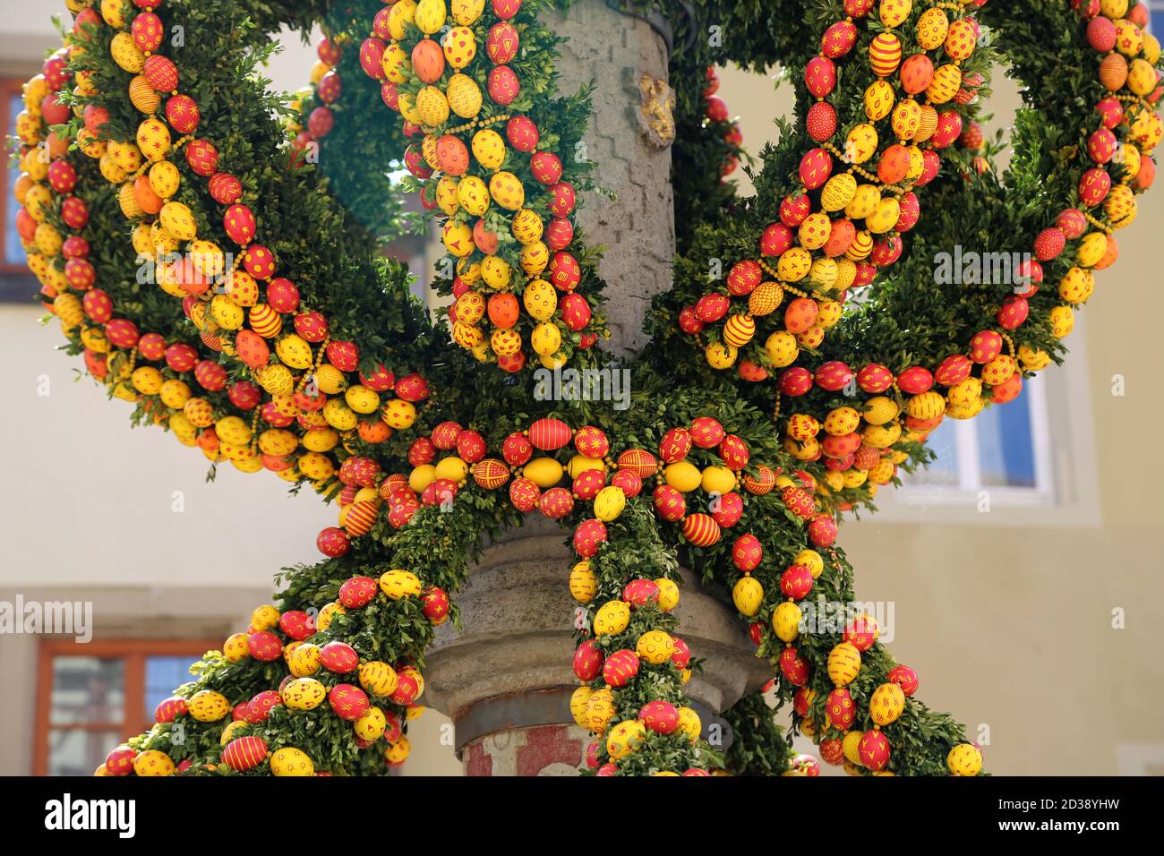 Colorful easter egg decorations on a pole Stock Photo - Alamy