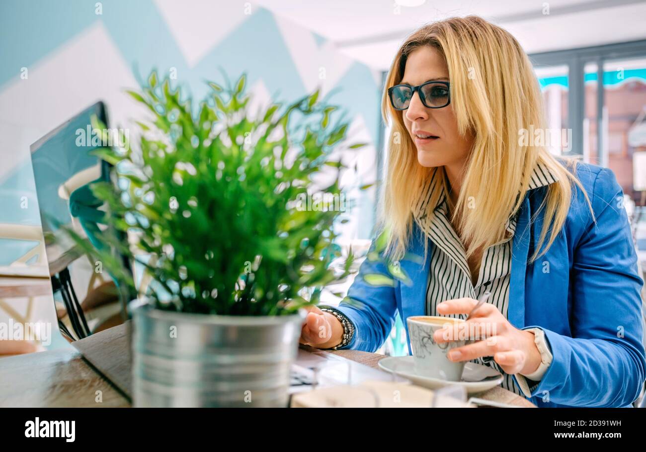 Industrious woman hi-res stock photography and images - Alamy