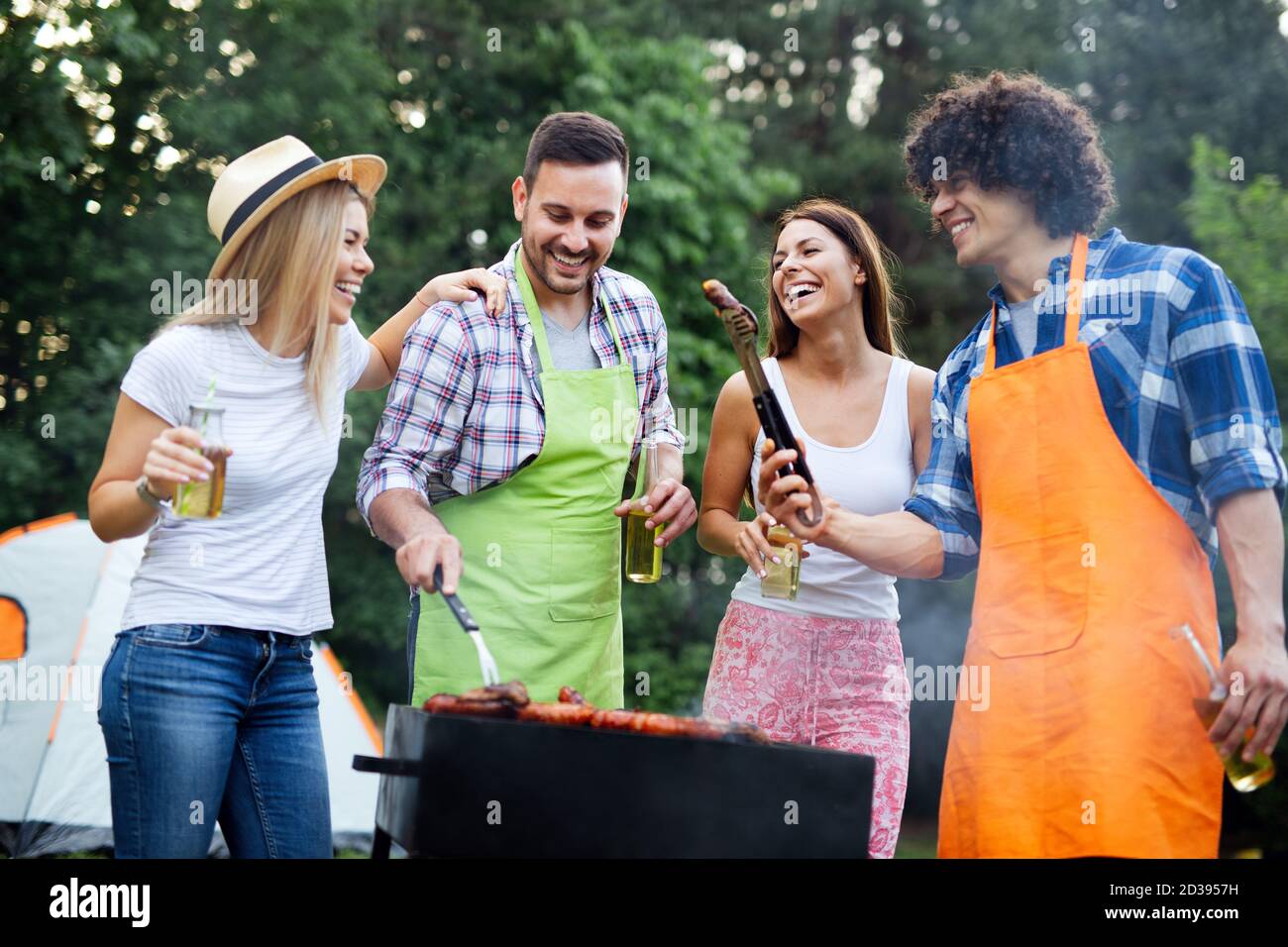 Friends having fun bbq party hi-res stock photography and images - Alamy