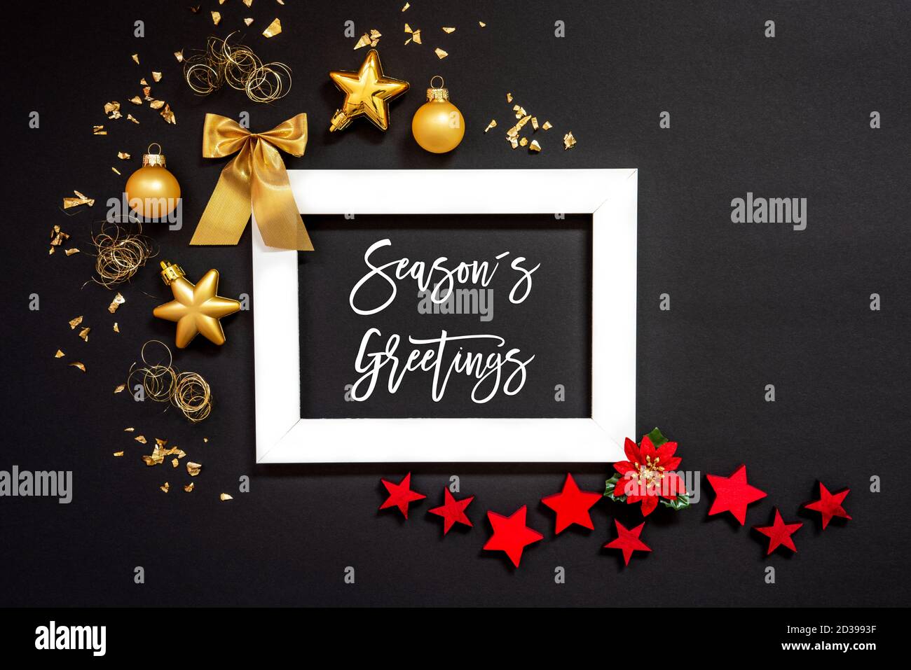 Golden ornament seasons greetings text hi-res stock photography and ...