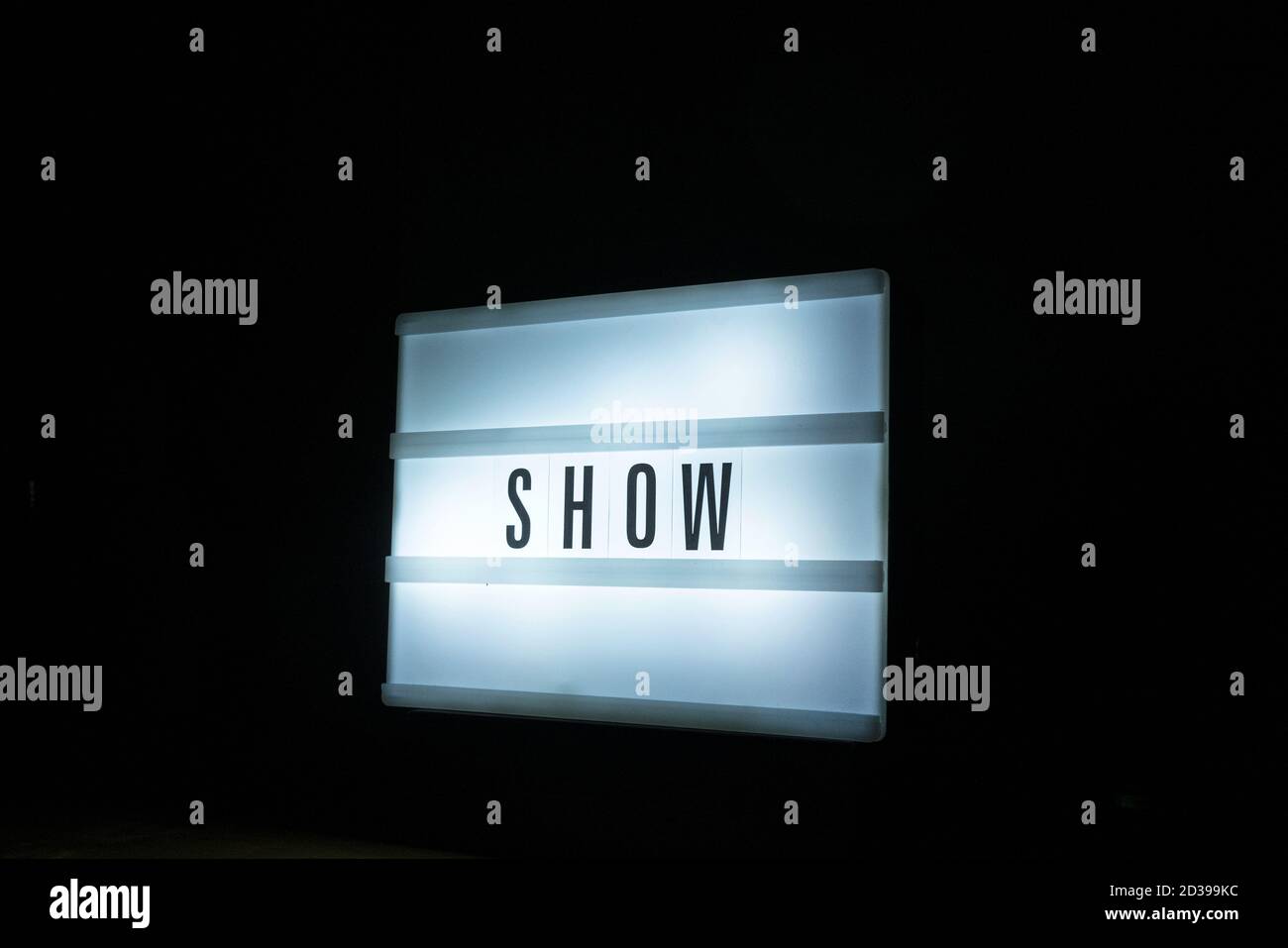 a bright red colored sign with the word SHOW Stock Photo - Alamy