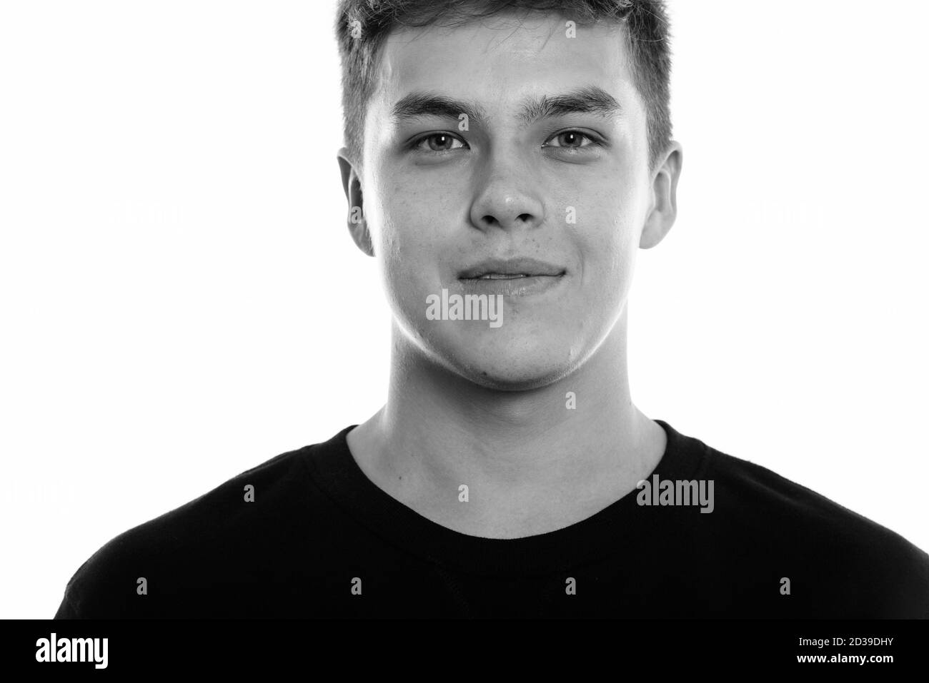 Face of young handsome man looking at camera Stock Photo - Alamy