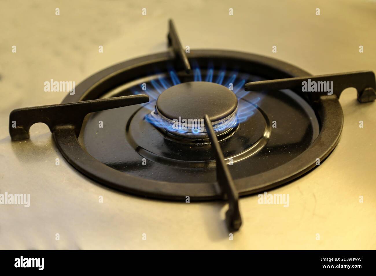 Burning gas, gas stove burner, hob in the kitchen Stock Photo - Alamy