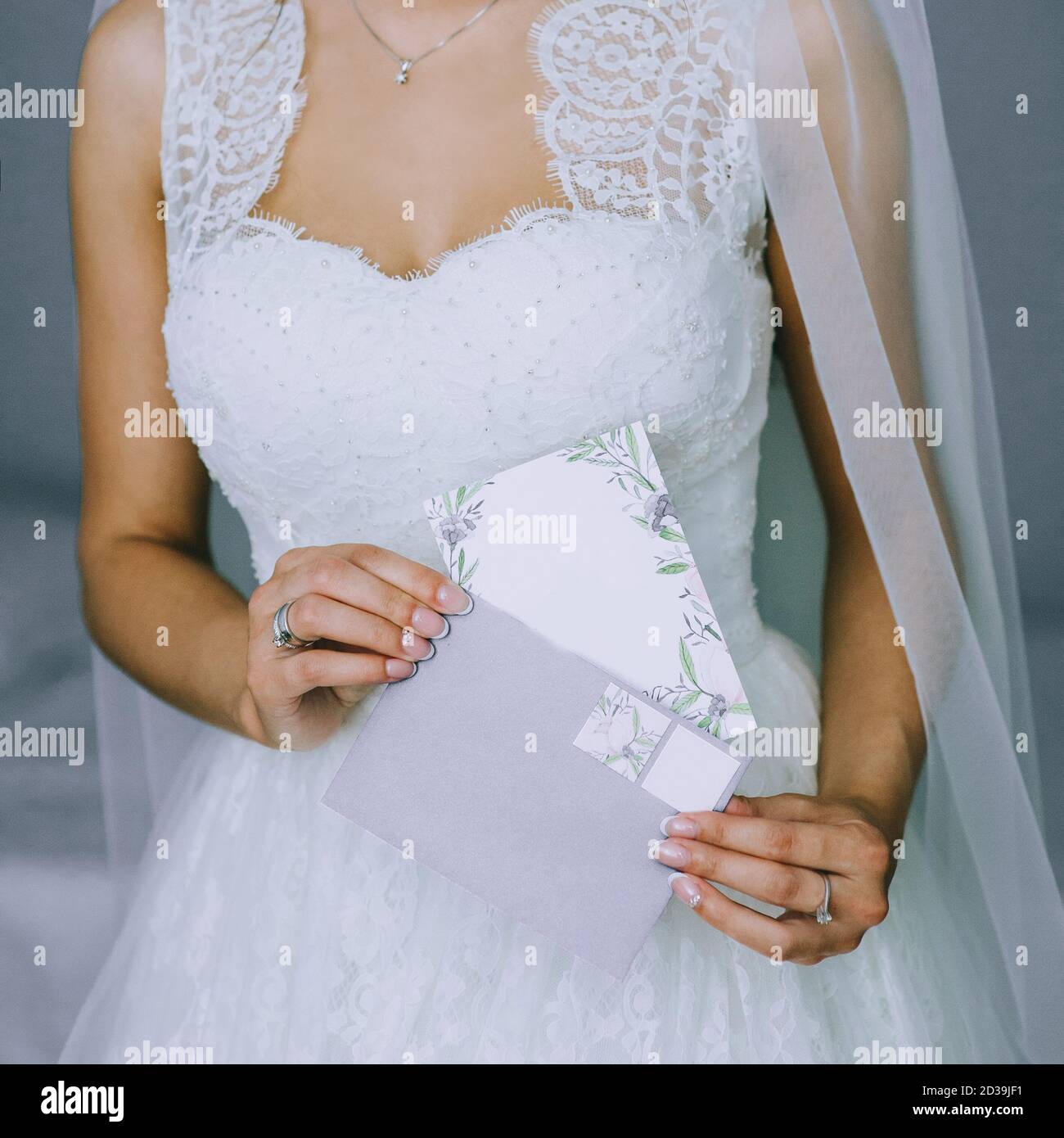 Details of a wedding dress. Close up of faceless girl in beautiful ...