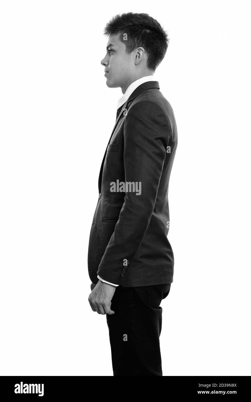 Businessman standing isolated side view Black and White Stock Photos ...
