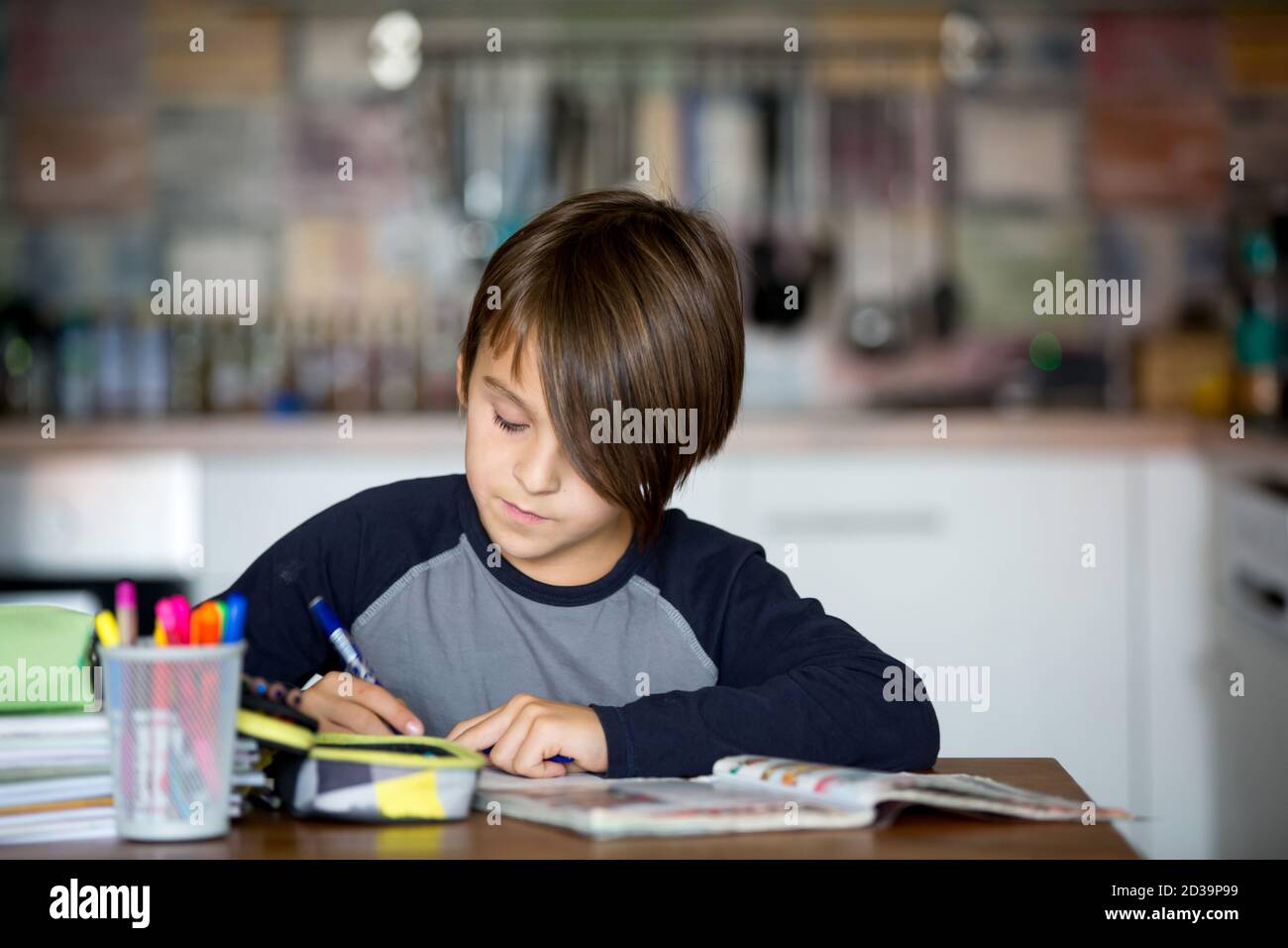 Child, writing homeworks, kid learning at home during pandemic Covid ...