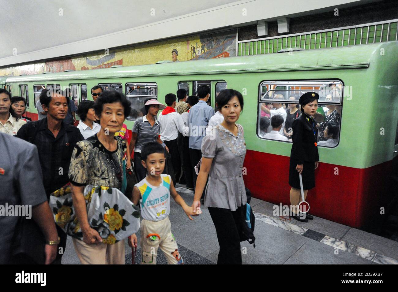 09.08.2012, Pyongyang, North Korea, Asia - Commuters on an underground ...