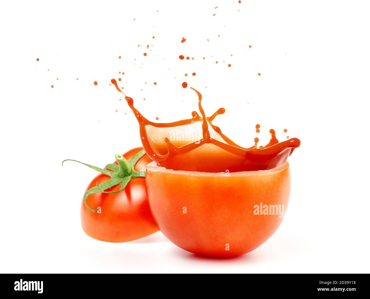 splashing tomato juice isolated on white background Stock Photo - Alamy