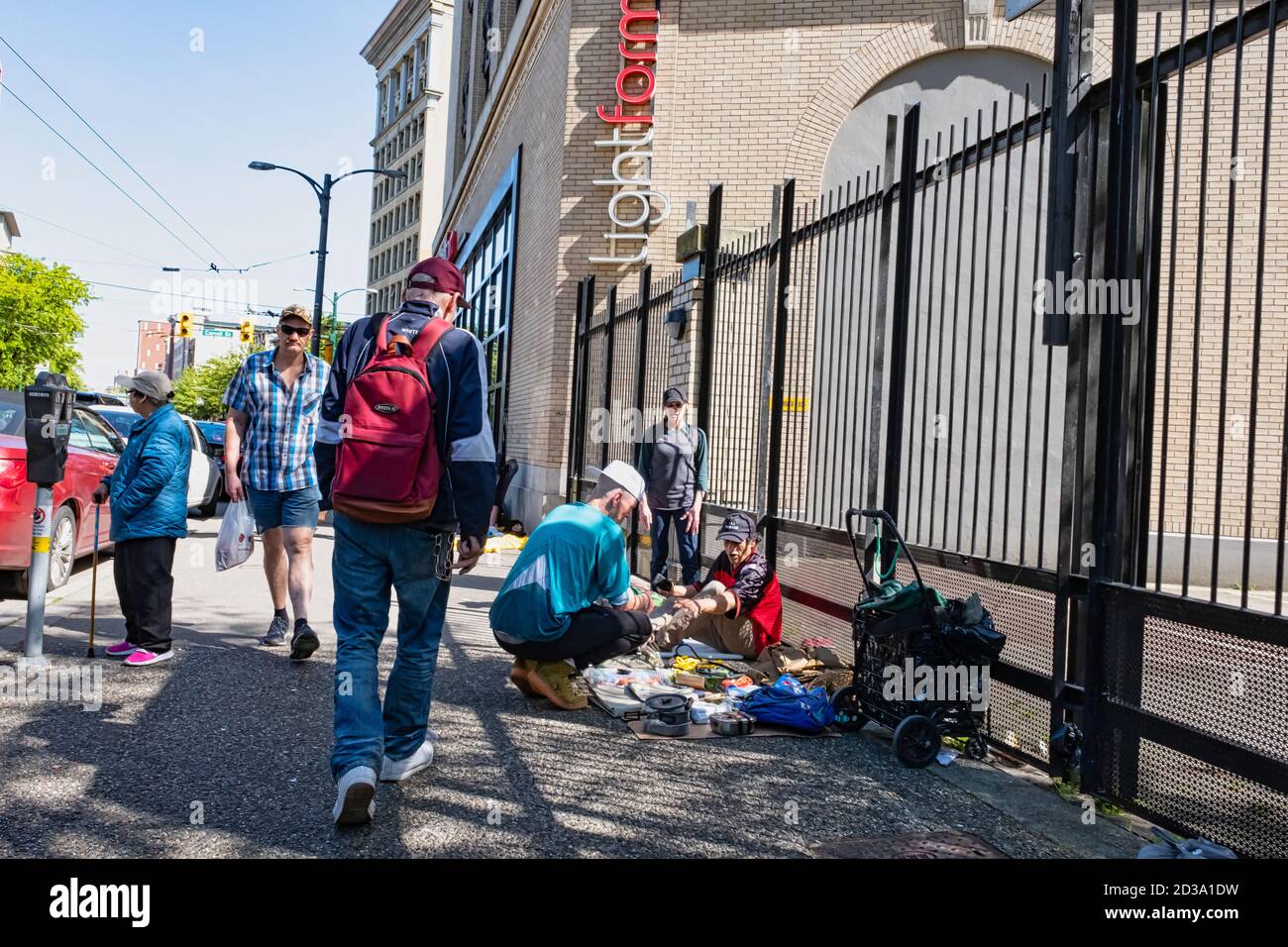 Homeless man laying sidewalk hi-res stock photography and images - Alamy