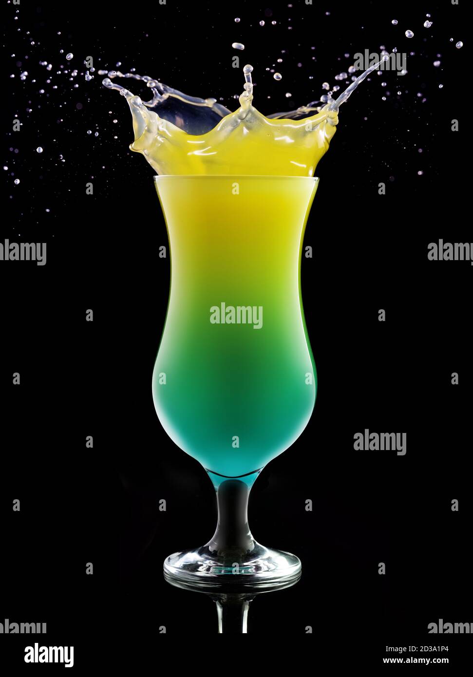 tropical cocktail splashing isolated on black Stock Photo - Alamy