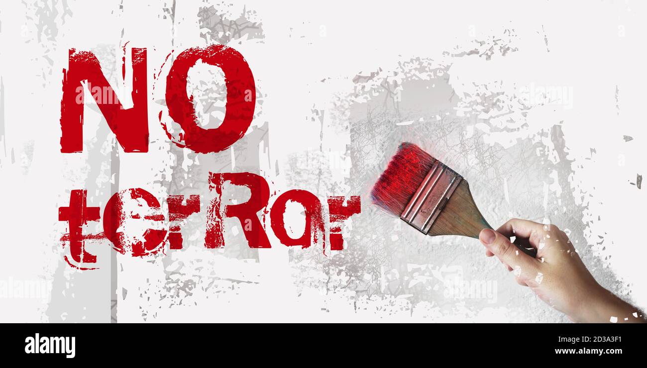 Stop Terror with red paint on he grunge wall. No violence social ...
