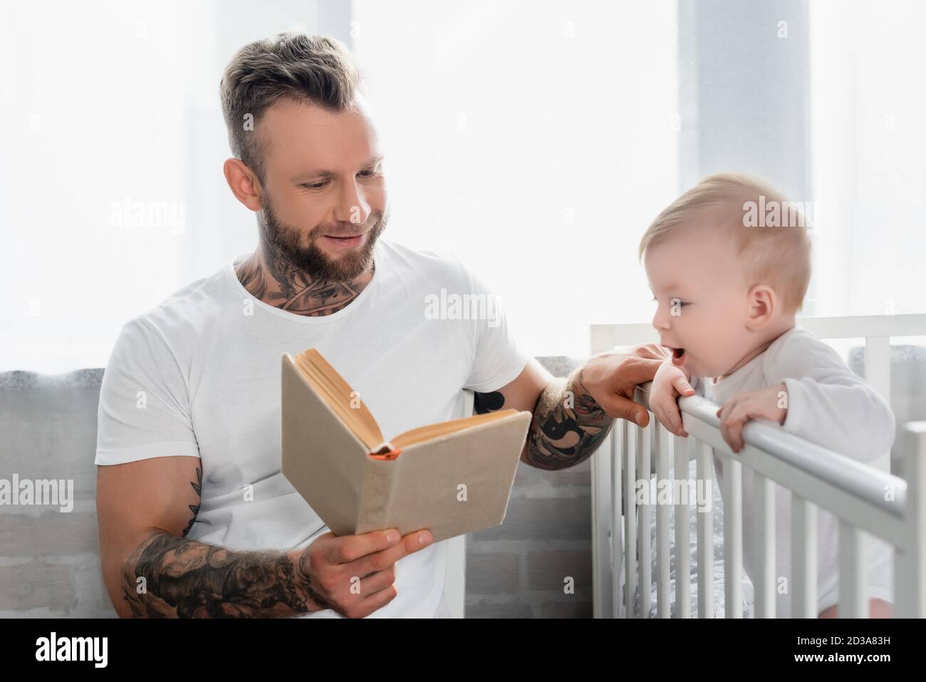 Reading baby cot hi-res stock photography and images - Alamy