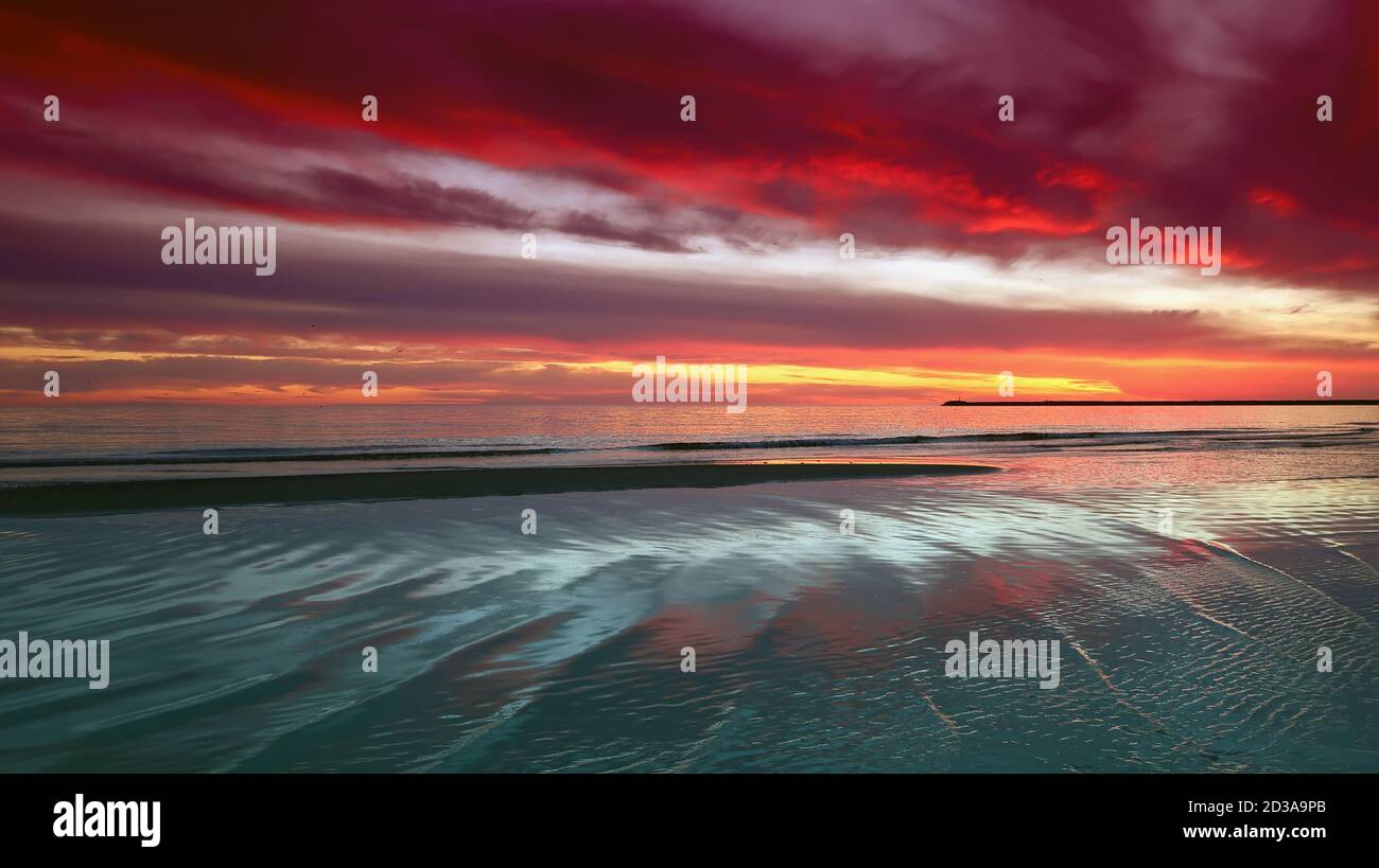 Mole at sunset, North Sea, Hvide Sande Stock Photo - Alamy