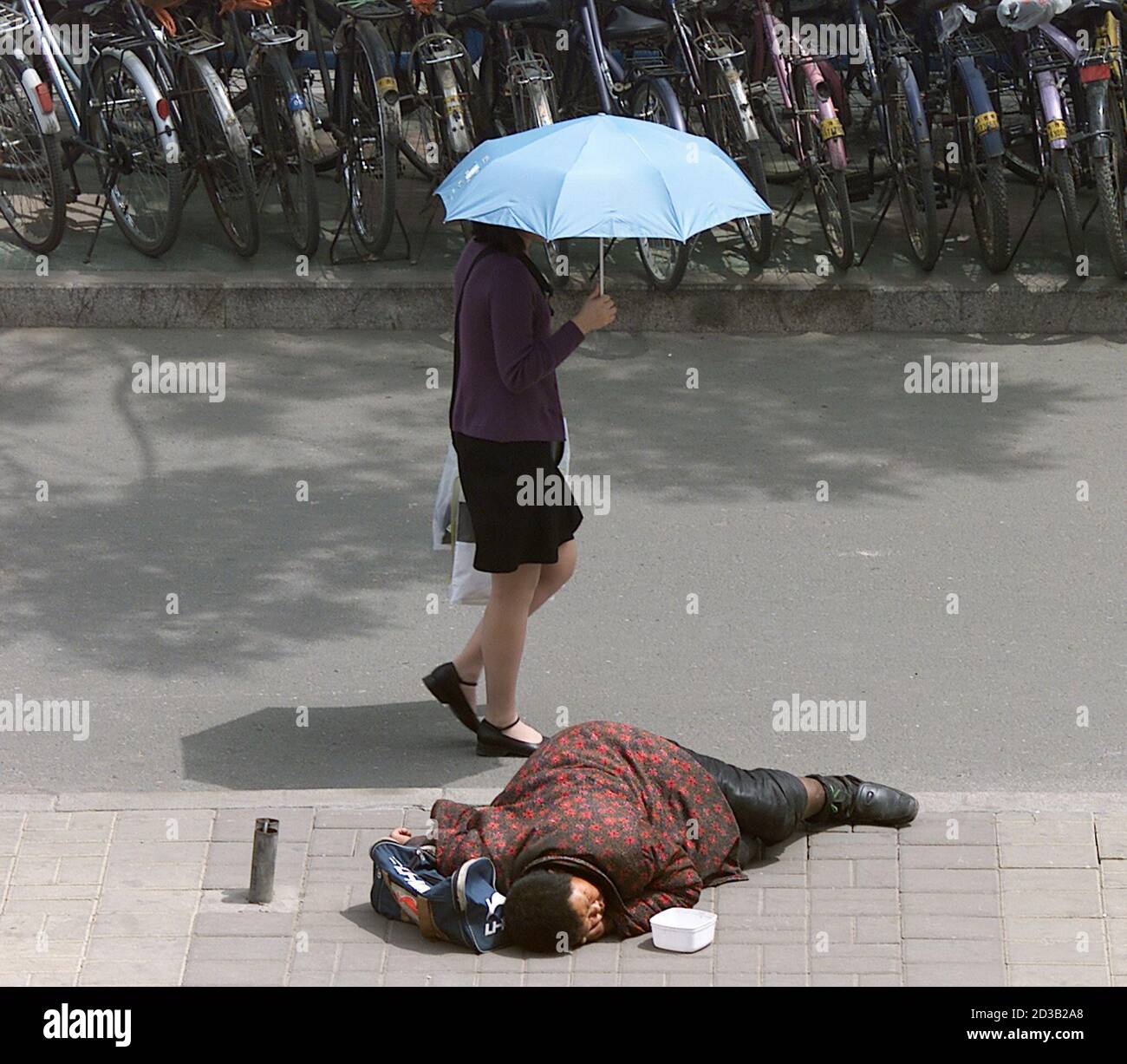 Beggar woman walks hi-res stock photography and images - Alamy