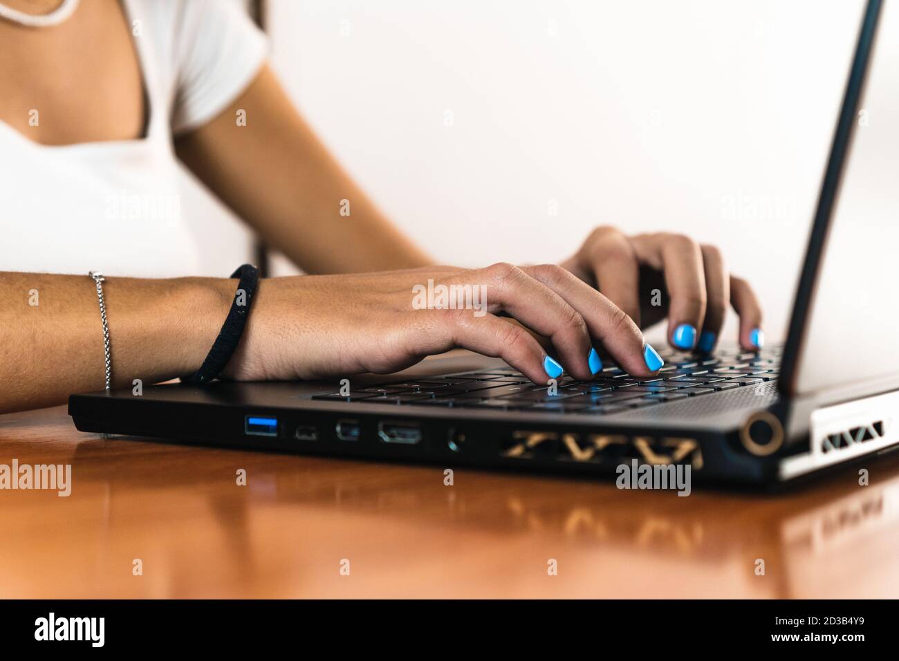 Closeup girls hands on laptop hi-res stock photography and images - Alamy