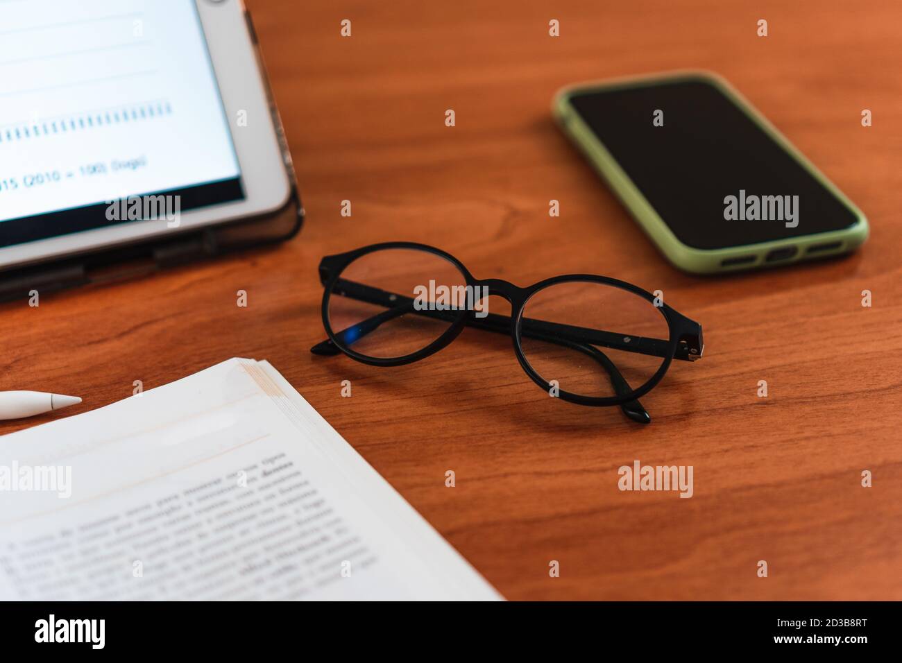 Closeup of a messy student table Stock Photo - Alamy