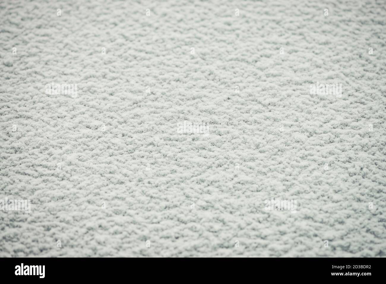 Snowy solid texture. Background detailed snow image on a flat surface ...