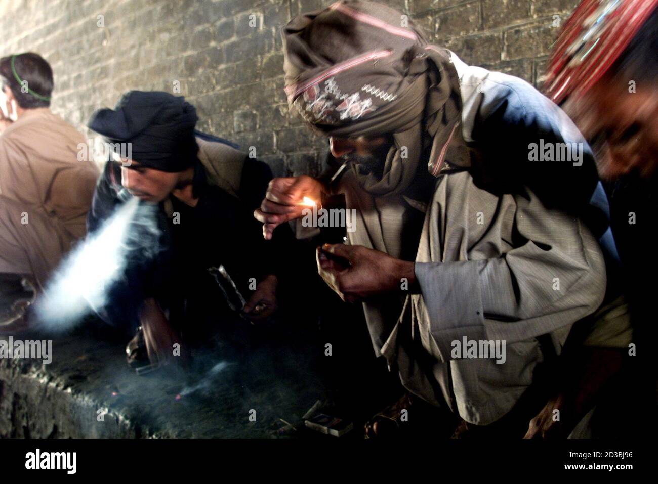 Drug addicts smoke heroin in hi-res stock photography and images - Alamy