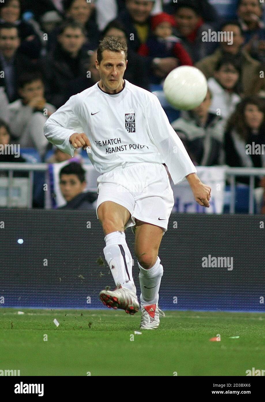 Michael schumacher on the ball during a game of soccer hi-res stock ...